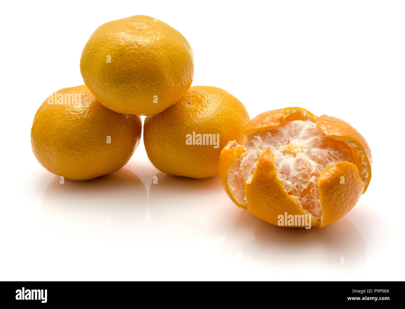 Three tangerines isolated on white background heap of three whole and ...
