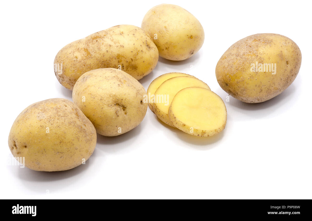 Group of whole potatoes with slices isolated on white background Stock ...