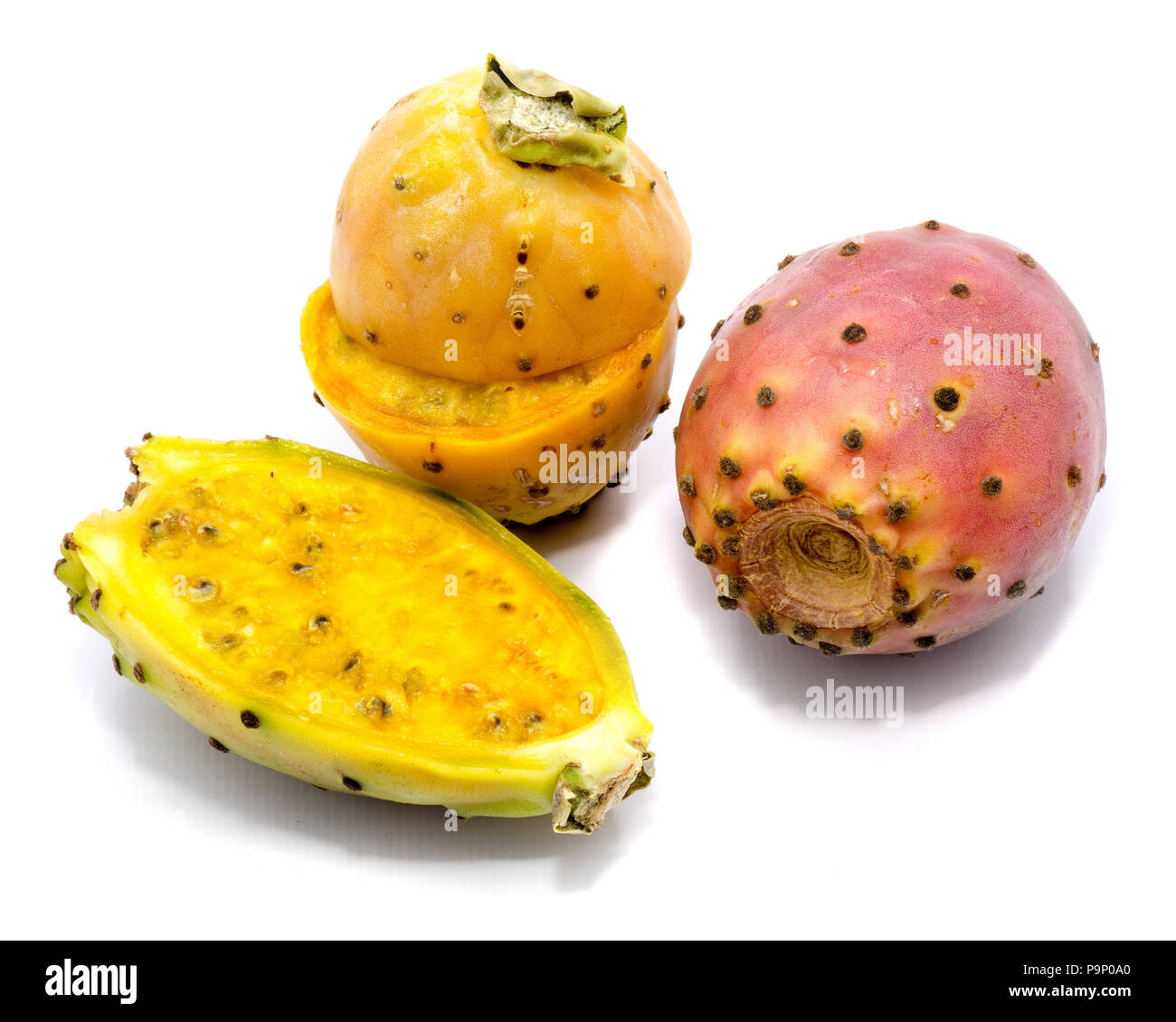 Sliced one whole pink prickly pear and halves, isolated on white ...