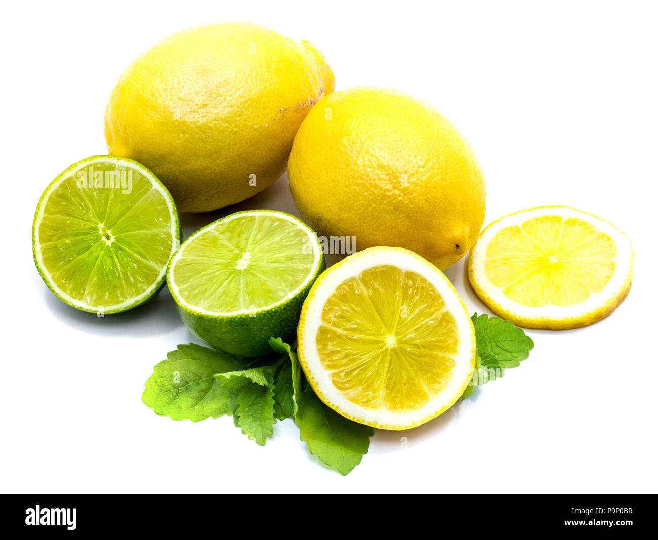 Two whole and sliced yellow lemon with lime halves isolated on white ...
