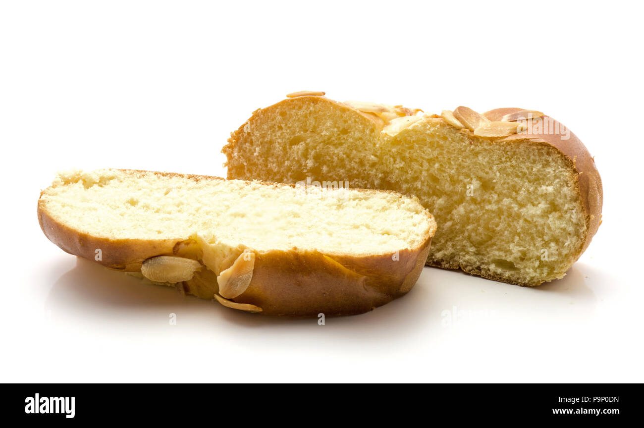 Two sliced pieces of braided bread isolated on white background Stock ...