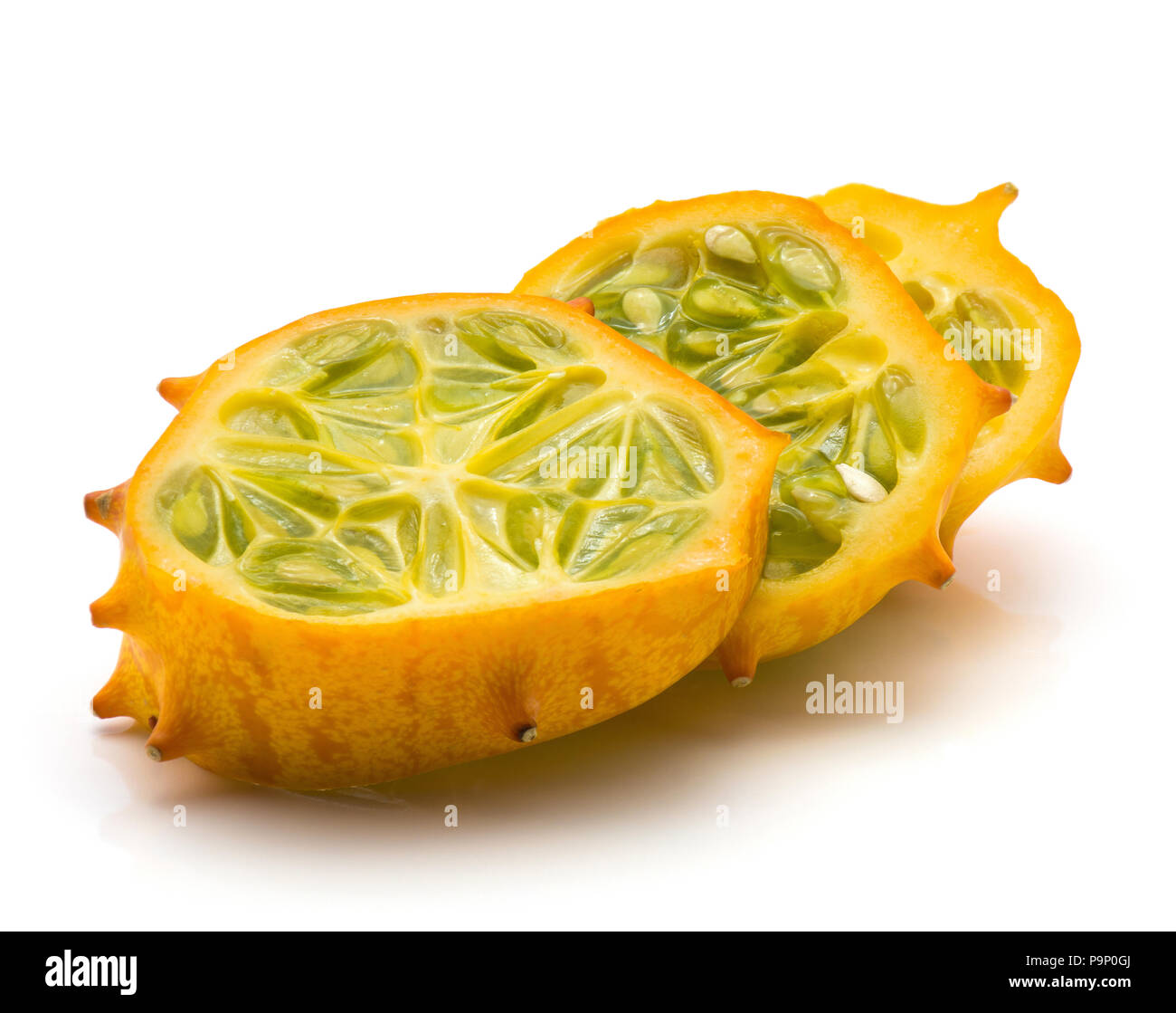 Three slices kiwano isolated on white background Stock Photo - Alamy