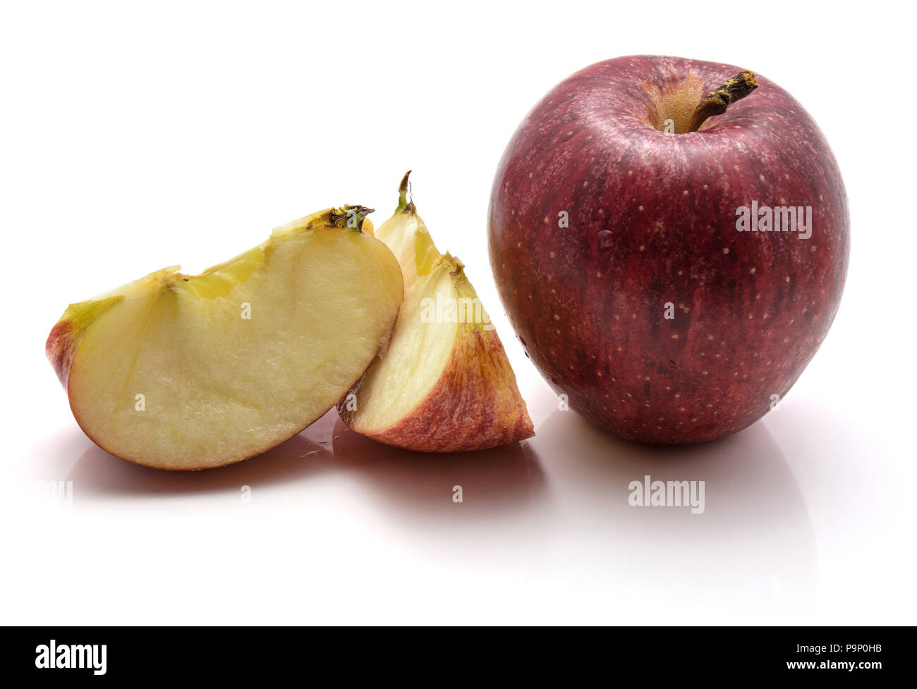 Gala apple isolated on white background one whole and two slices Stock ...