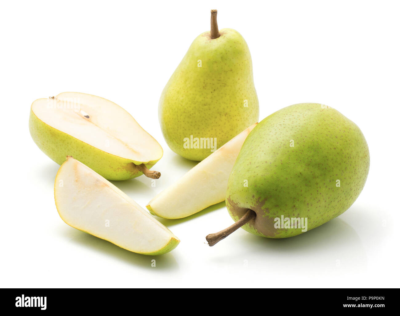 Green pears stack isolated on white background two whole one half two ...