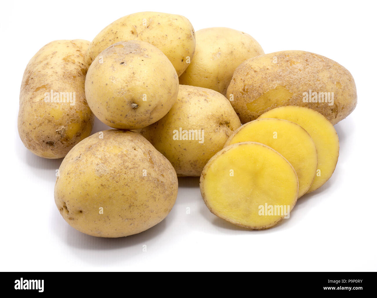 Group of whole potatoes with slices isolated on white background Stock ...