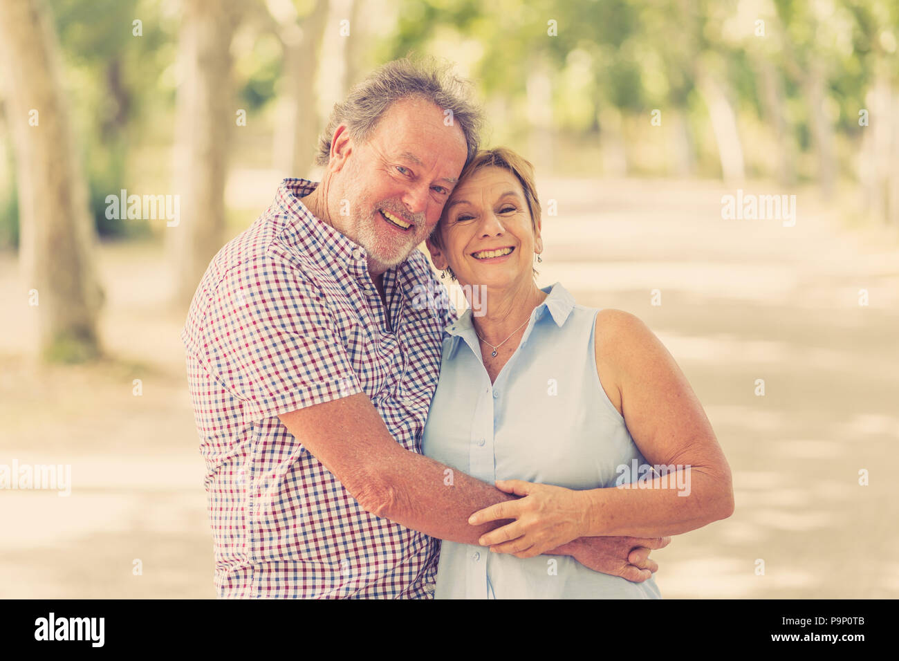 Happy smiling senior couple in love, relaxing, dancing and having fun ...