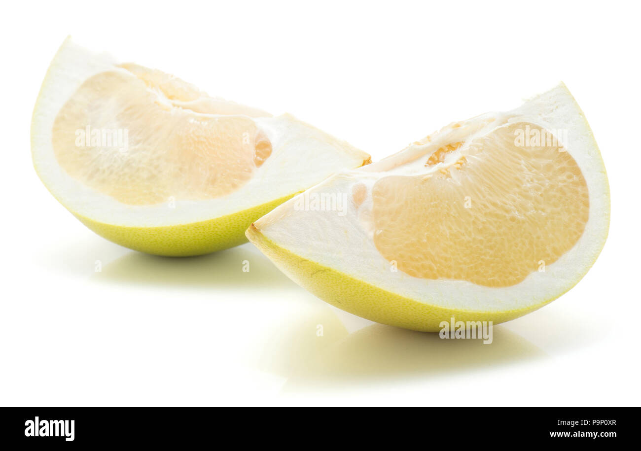 Two pamelo slices isolated on white background Stock Photo - Alamy