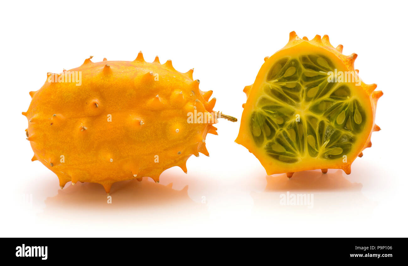 Kiwano isolated on white background one whole one cut in half Stock ...