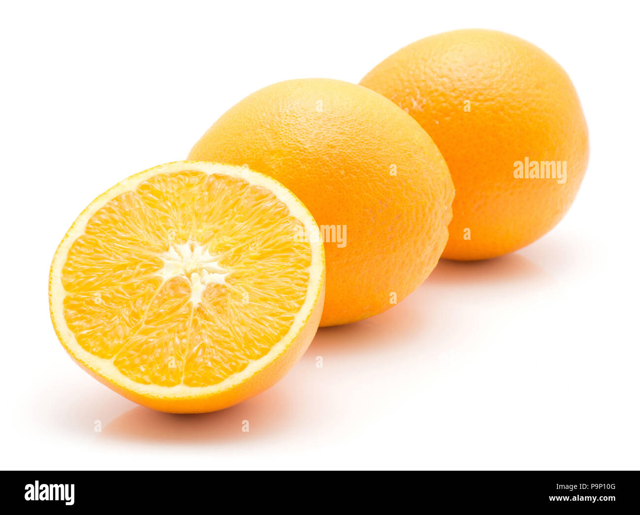 Two oranges in row and one half isolated on white background Stock ...