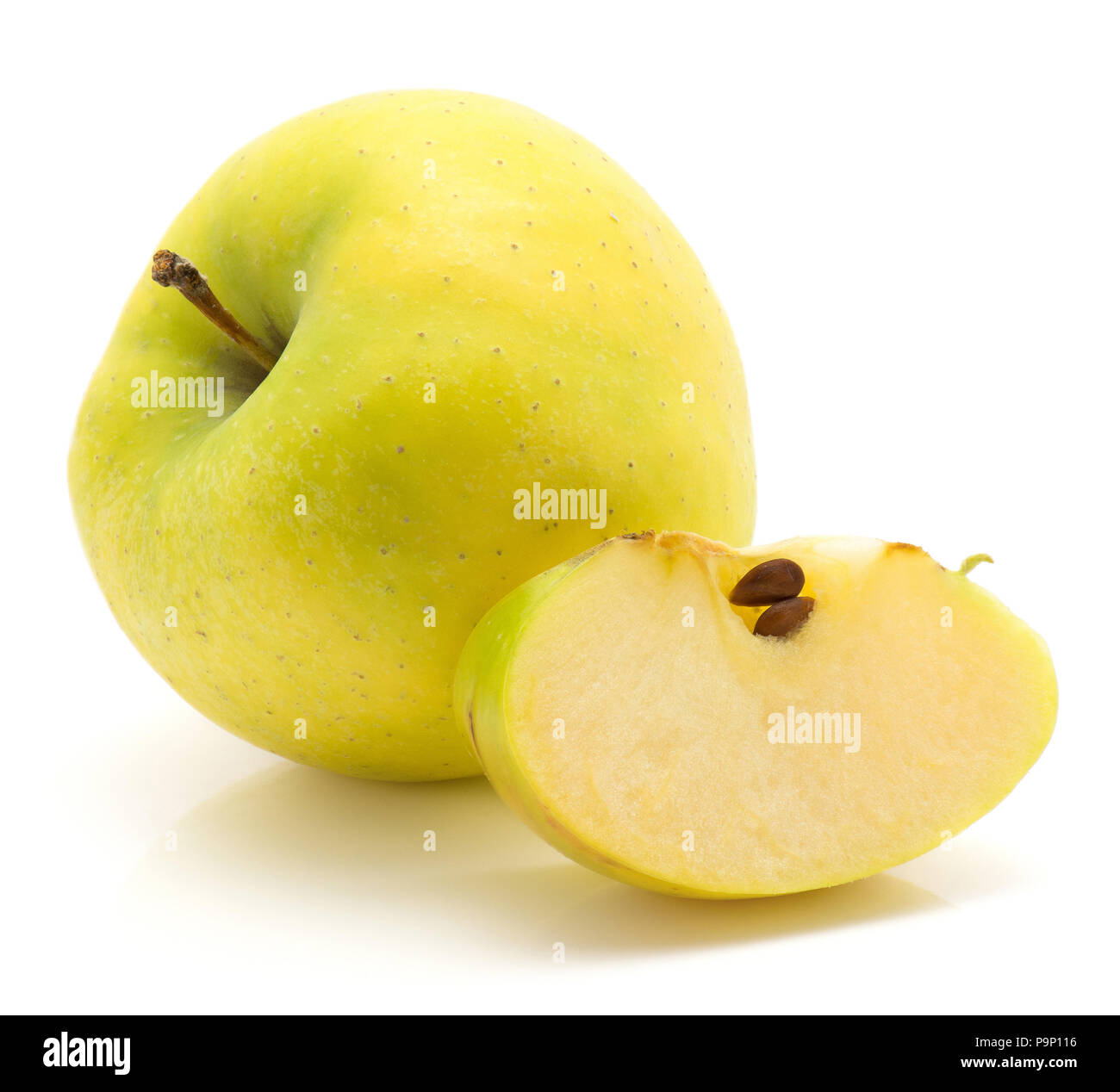 One apple (Smeralda variety) with a slice isolated on white background ...