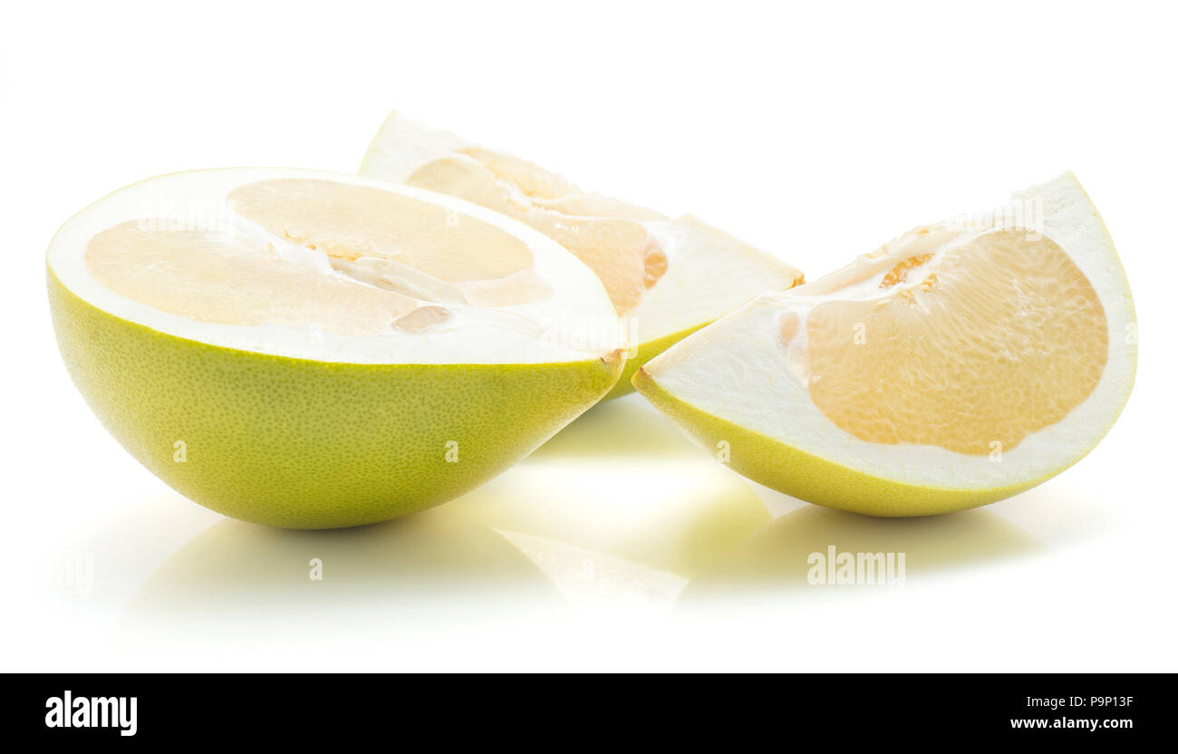Sliced pamelo isolated on white background two slices and one half ...