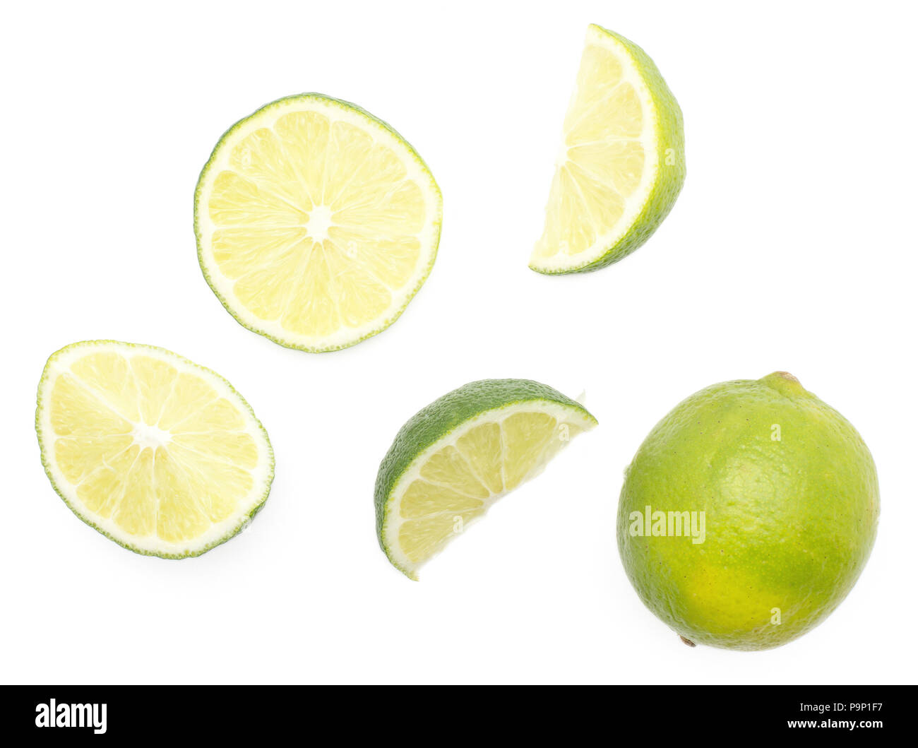 Limes top view isolated on white background one whole one ring two ...