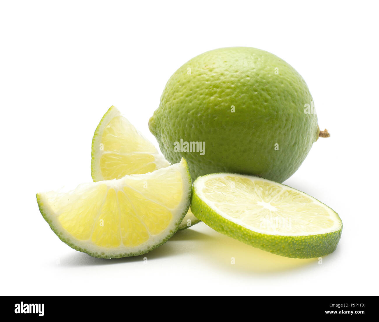Limes set isolated on white background one whole one sliced ring and ...