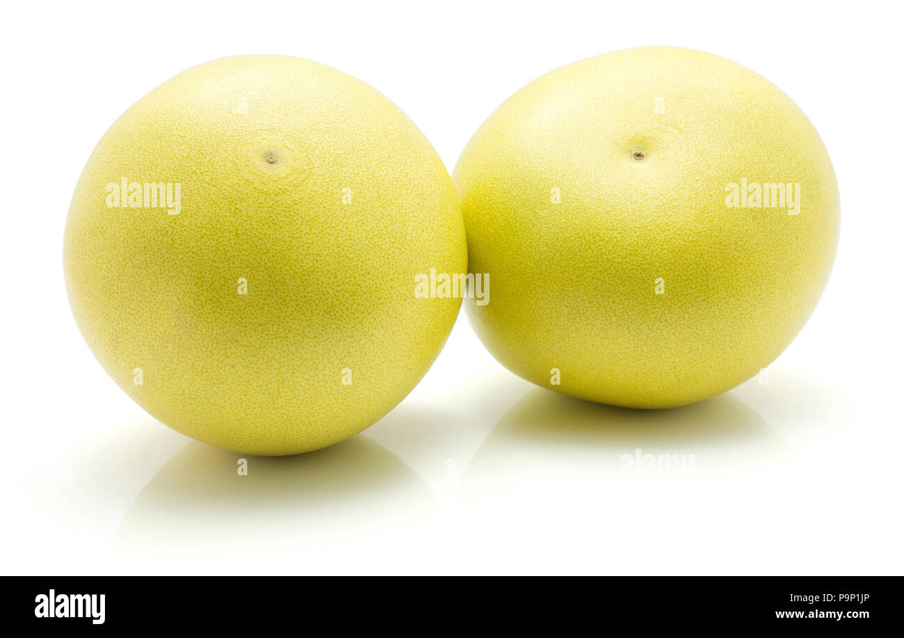 Two pamelo isolated on white background yellow pale green Stock Photo ...