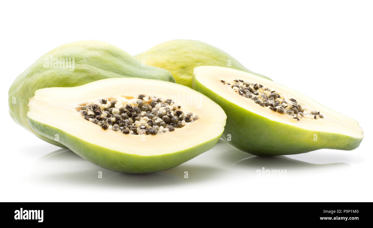Papaya (pawpaw, papaw) isolated on white background two whole green and ...