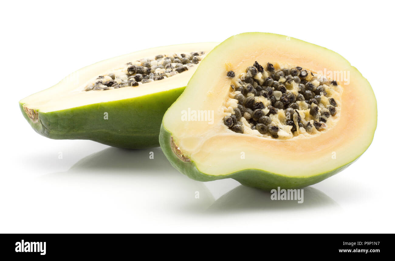 Sliced papaya (pawpaw, papaw) isolated on white background two cross ...