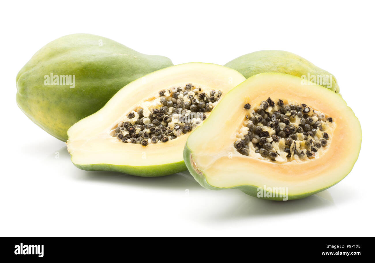 Papaya (pawpaw, papaw) isolated on white background two whole and two ...