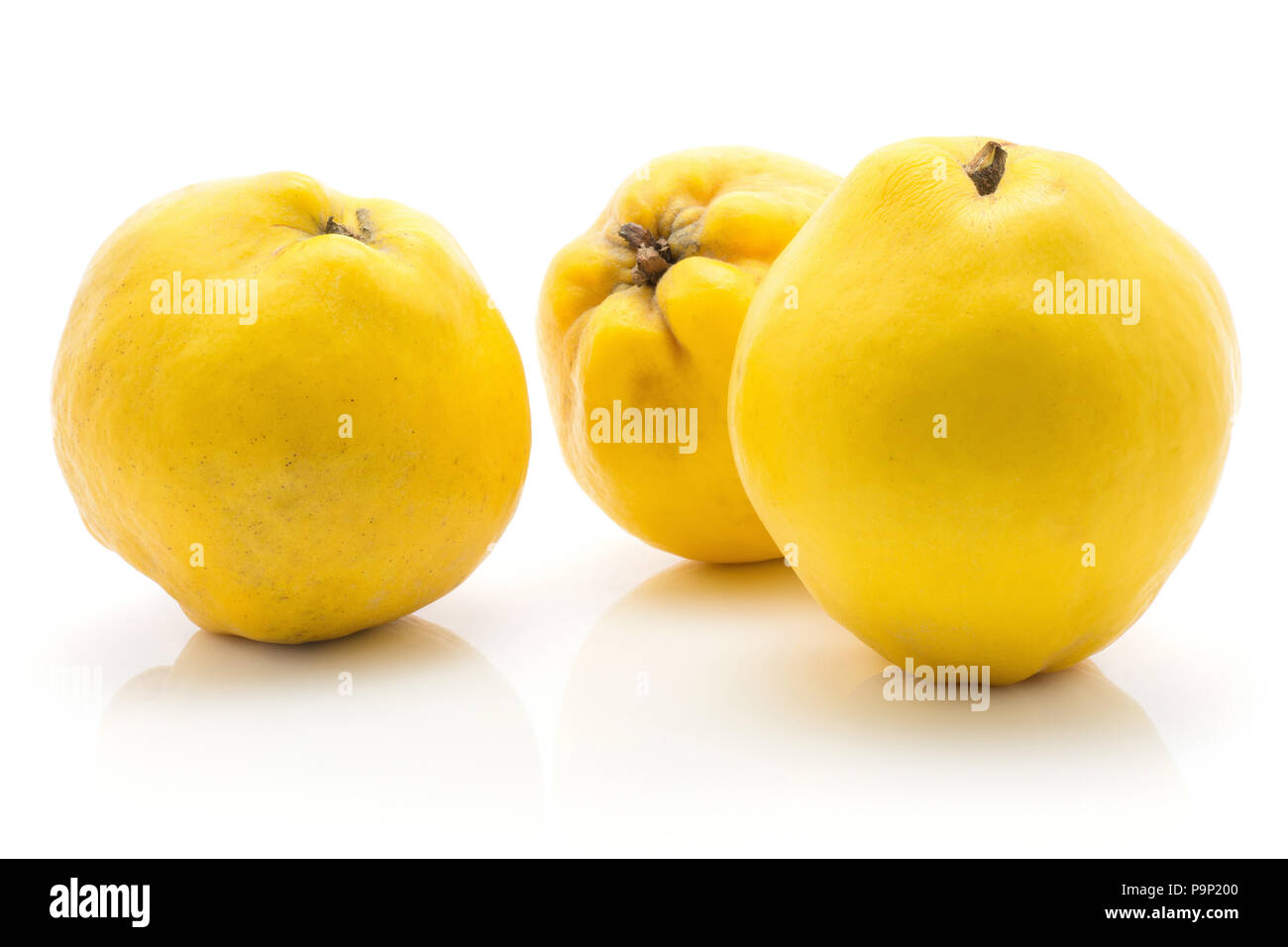 Three yellow quinces isolated on white background raw ripe Stock Photo ...