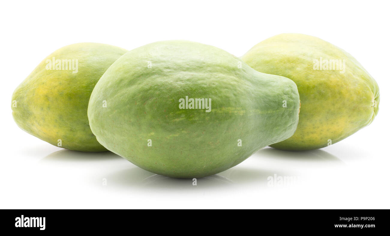 Three green papaya (pawpaw, papaw) isolated on white background fresh ...