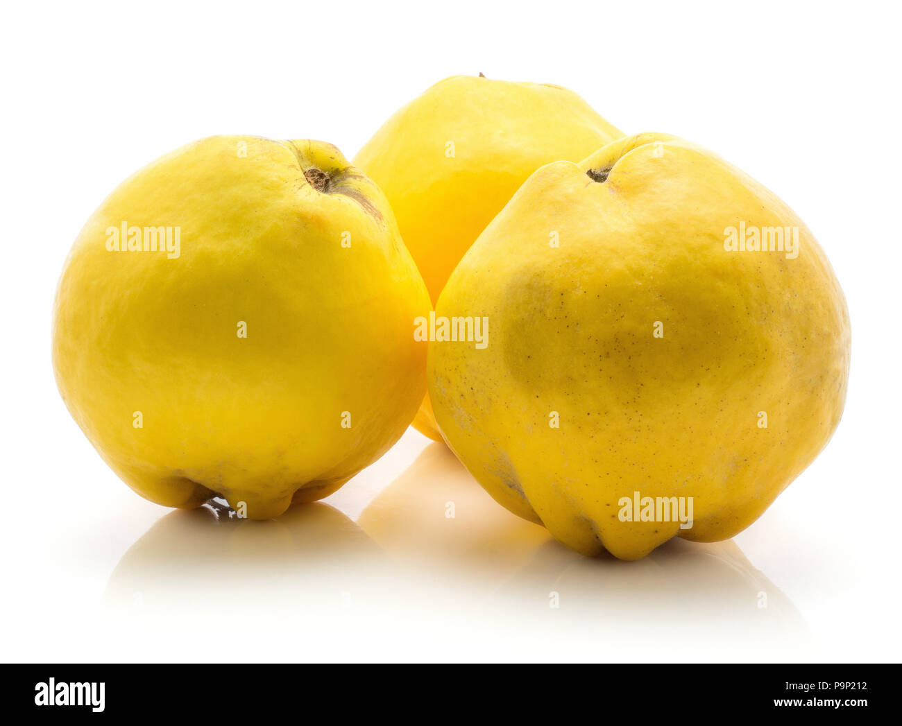 Three yellow quinces set isolated on white background raw ripe Stock ...