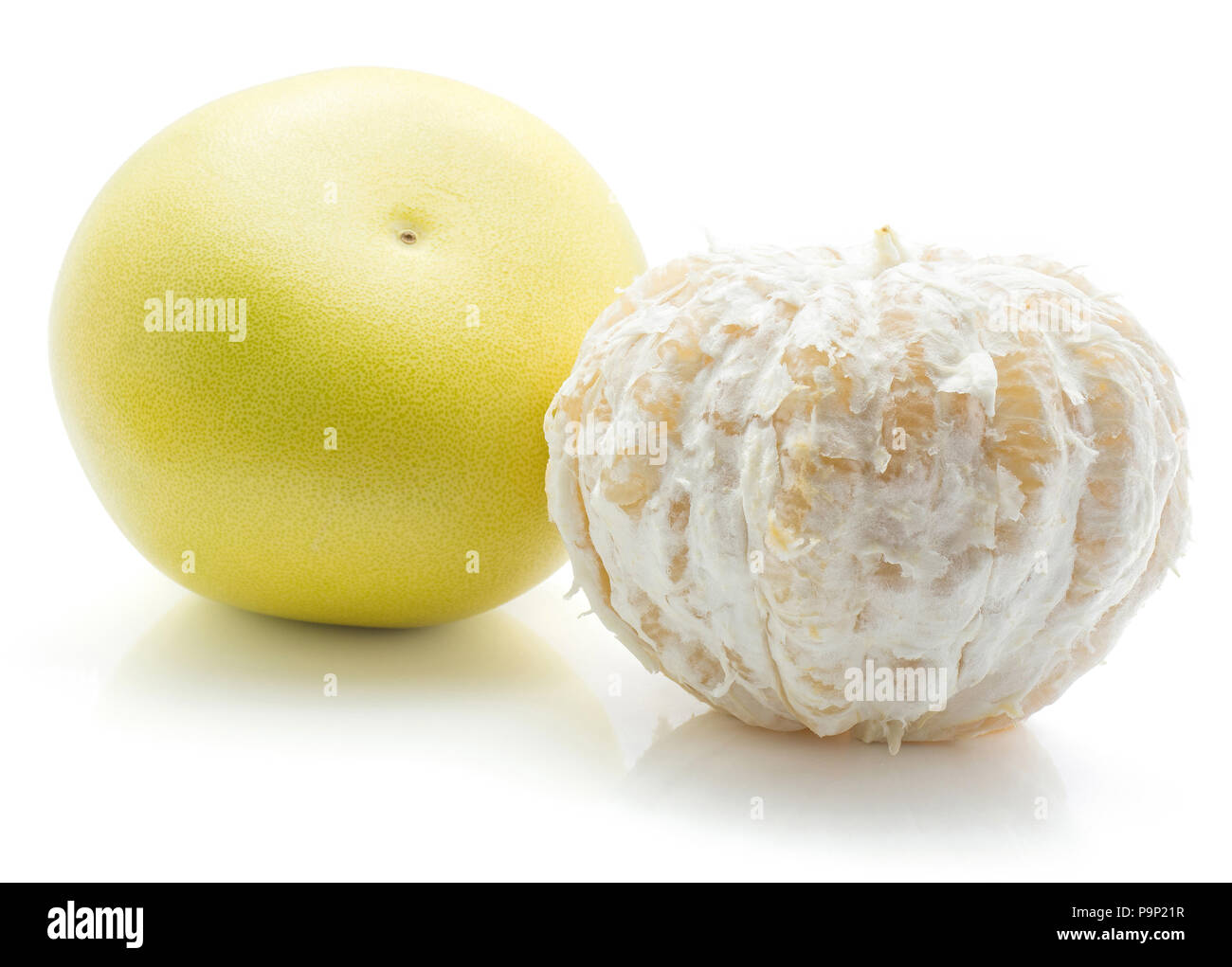 One peel pamelo comparing with unpeeled one isolated on white ...