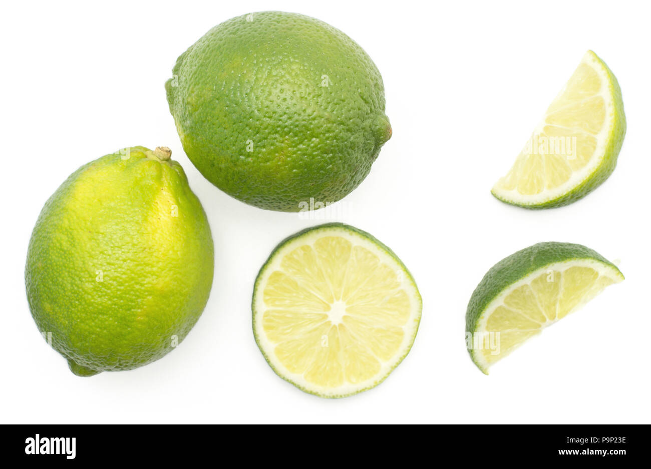 Limes top view isolated on white background two whole one ring and two ...