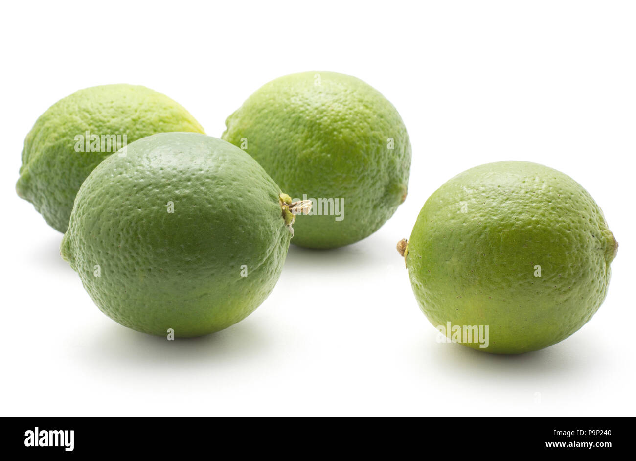 Four limes set isolated on white background ripe and fresh Stock Photo ...