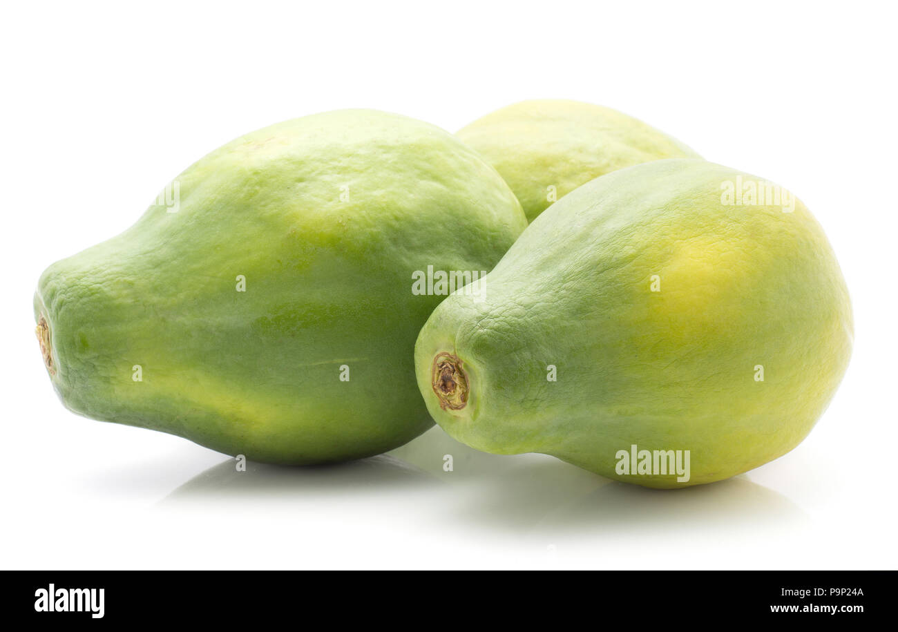 Three green papaya (pawpaw, papaw) isolated on white background fresh ...