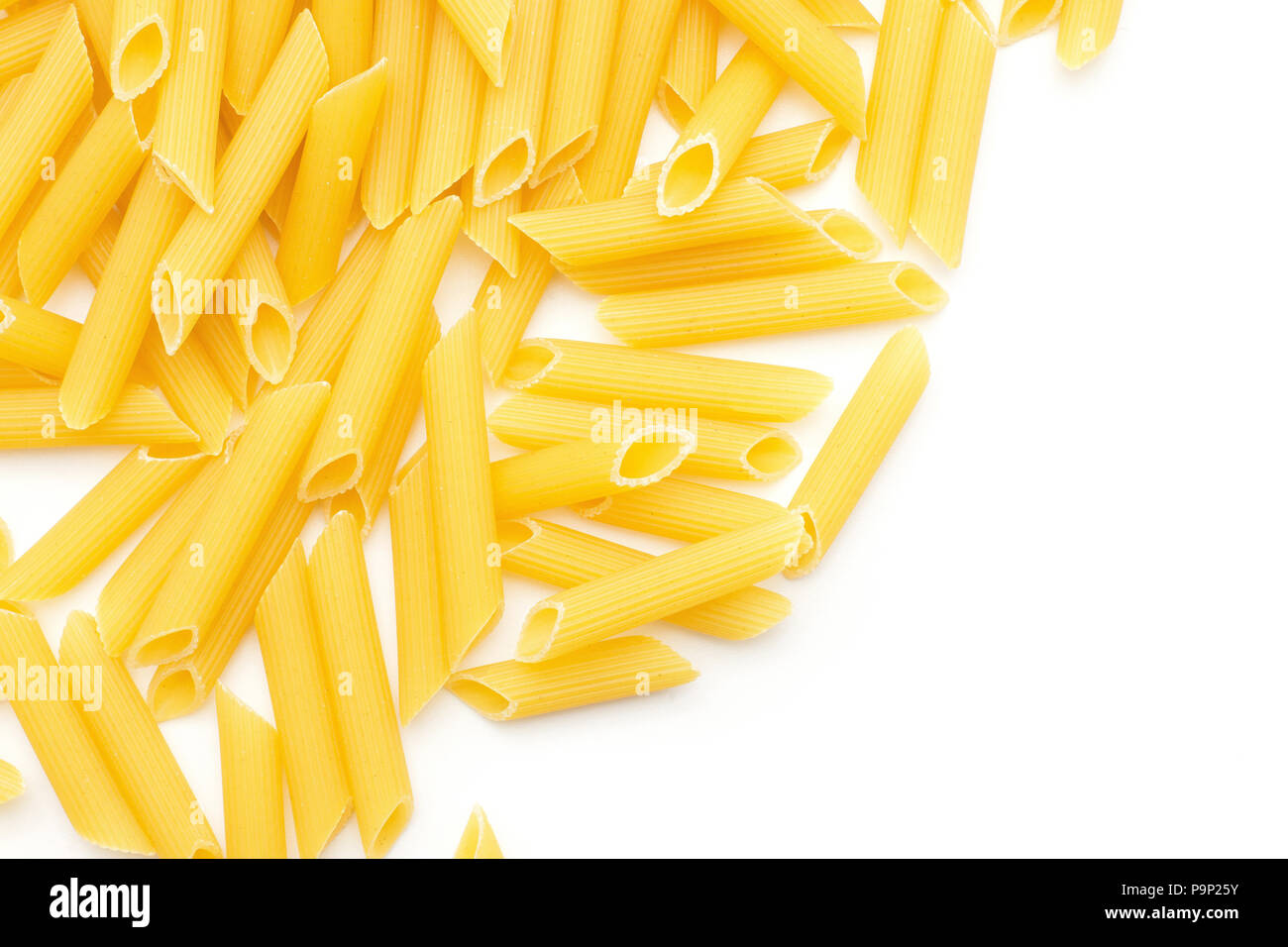 Penne rigate top view isolated on white background a lot of dry raw ...