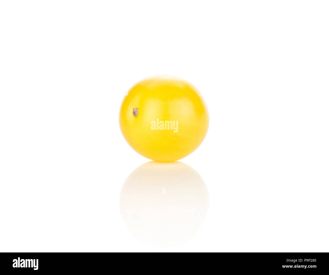 One yellow grape cherry tomato isolated on white background Stock Photo ...