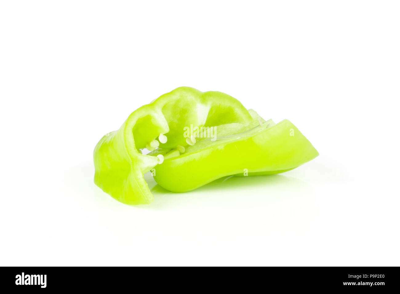 Group of two slices of light green bell pepper isolated on white Stock ...