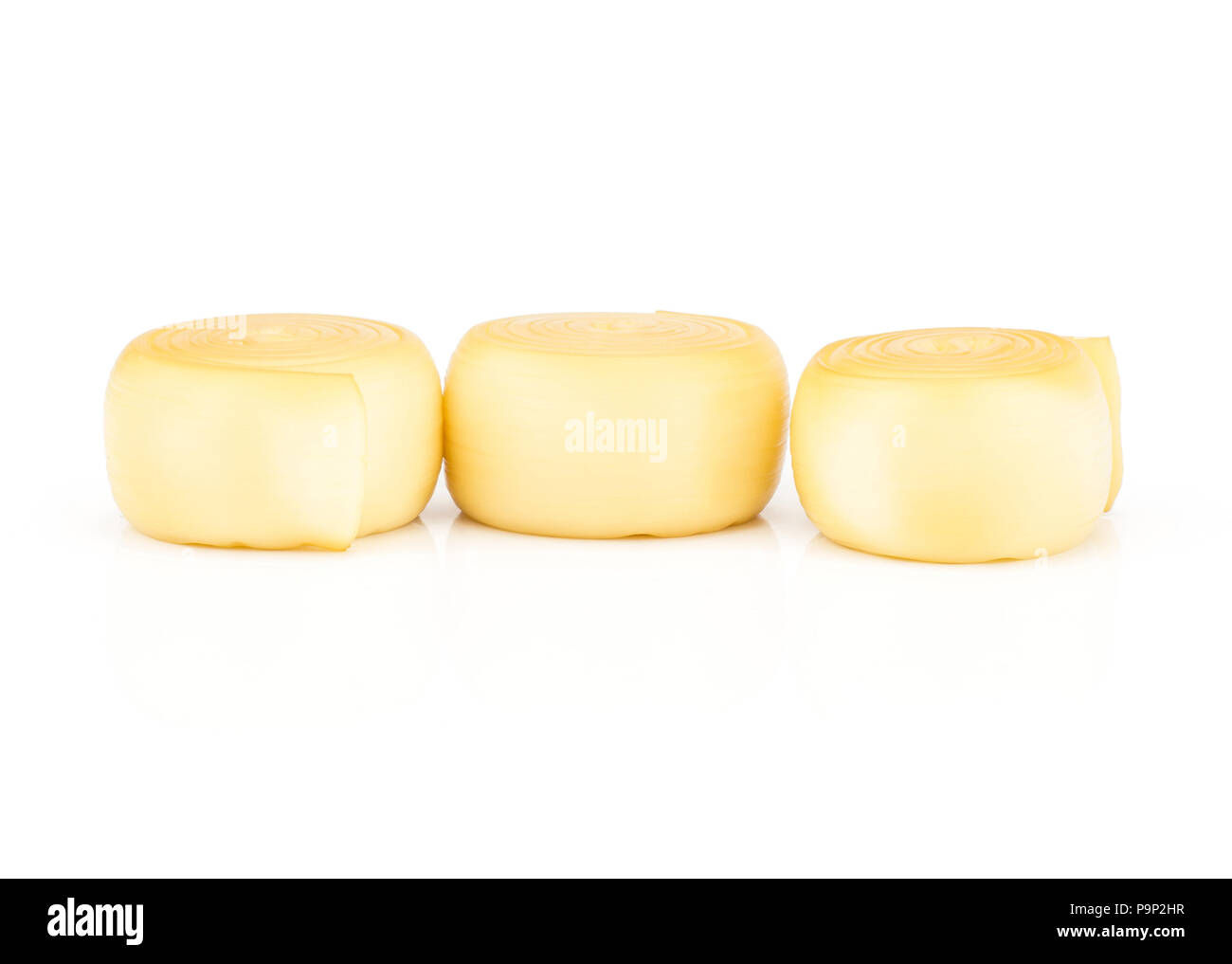 Slovak smoked cheese isolated on white background three pieces in row ...