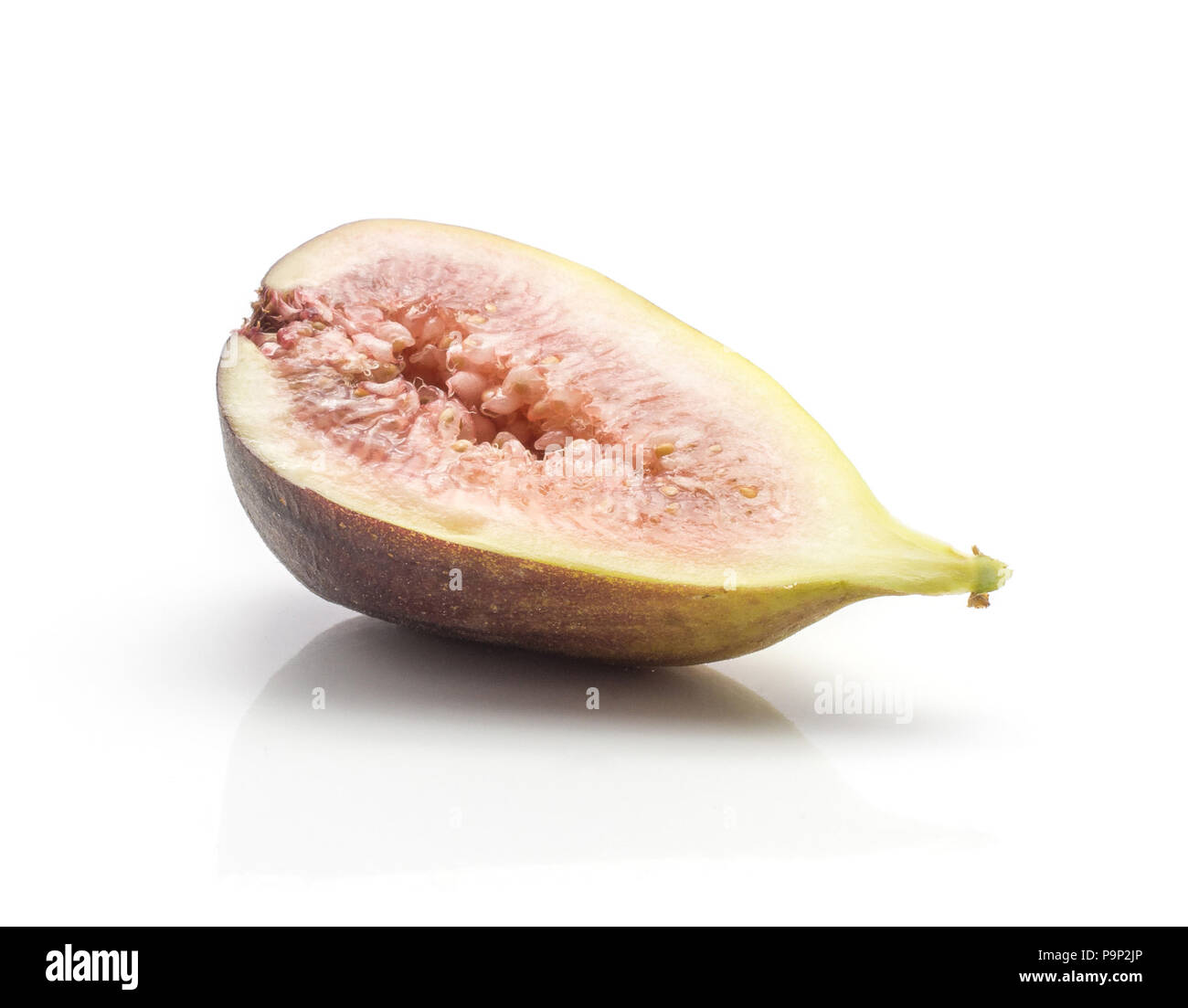 One fig sliced half with rose flesh isolated on white background ripe ...