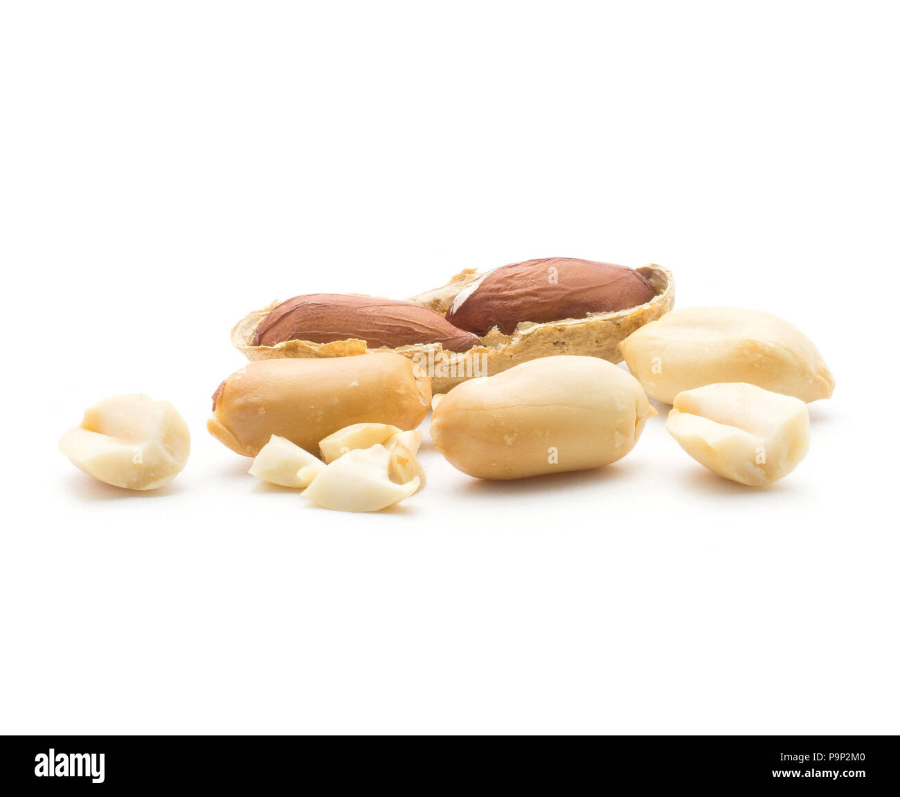 Peanuts (one open with seeds inside, other are without husk, broken ...