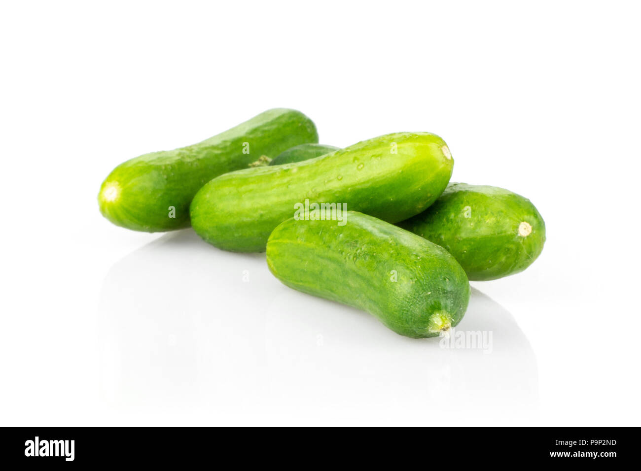 Miniature cucumbers Cut Out Stock Images & Pictures - Alamy