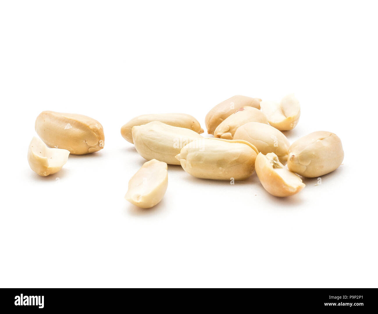 Shelled peanuts (raw and without husk, halves) isolated on white ...