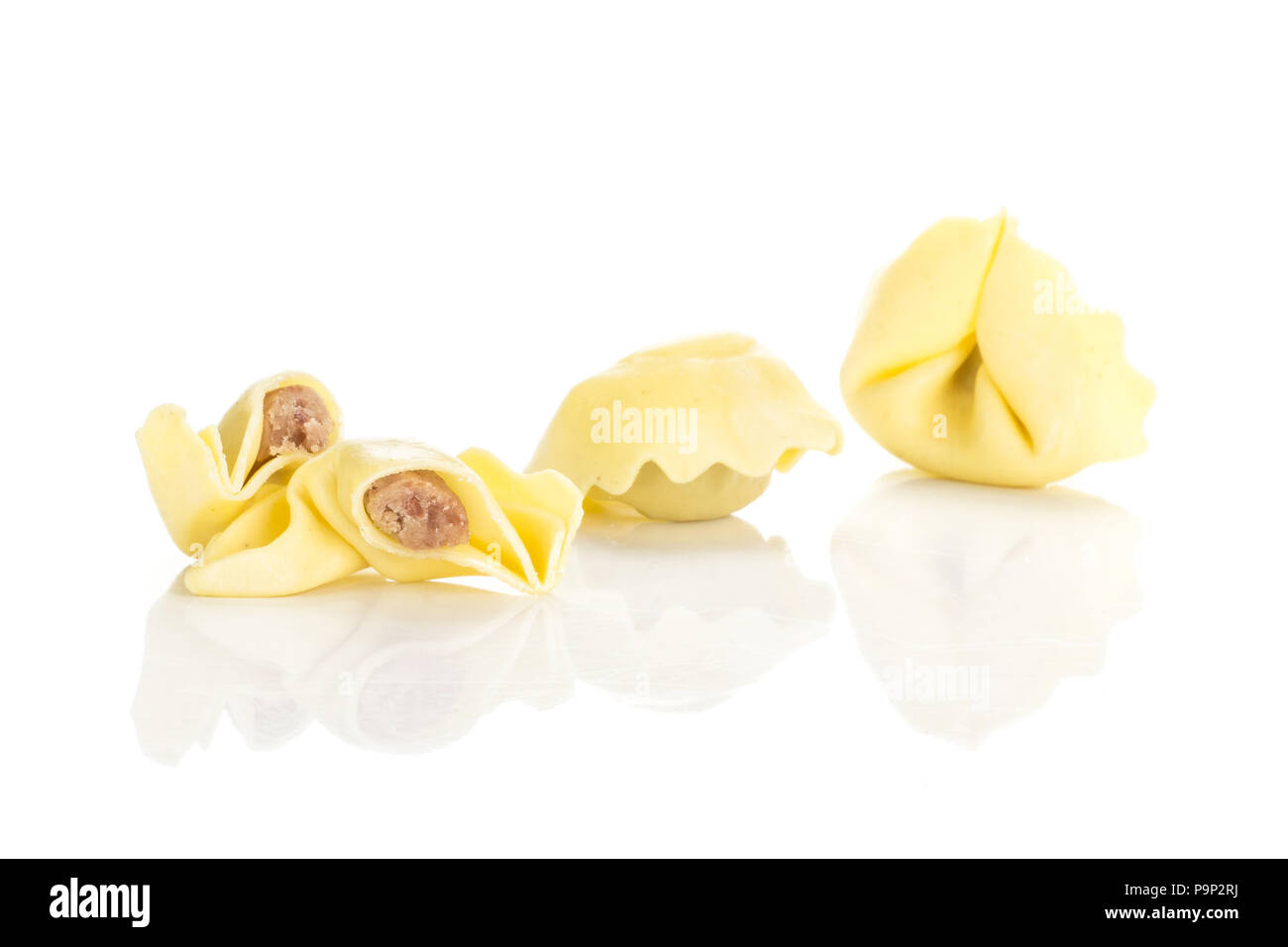 Tortellini Italian pasta stuffed with meat isolated on white background ...