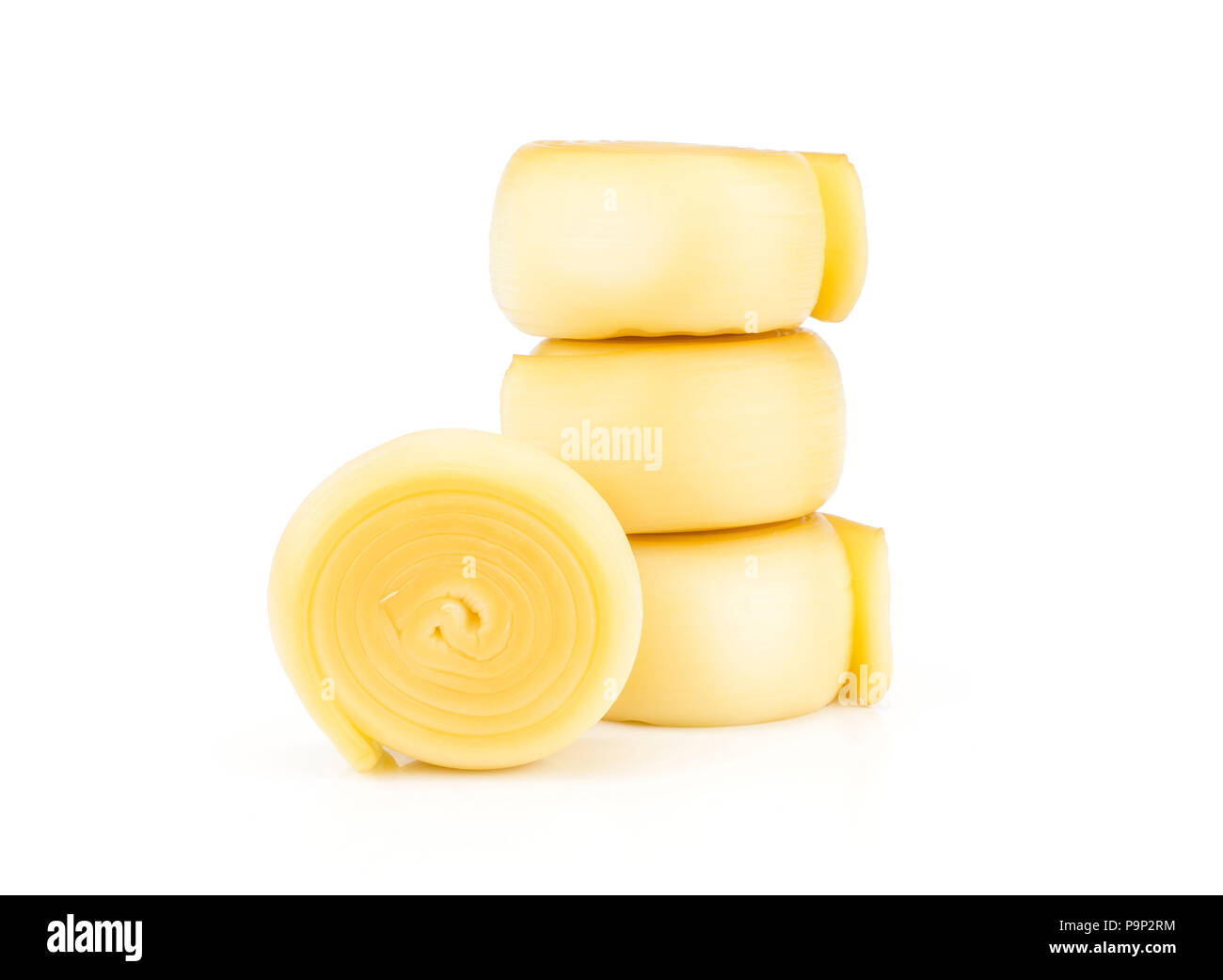 Slovak smoked cheese isolated on white background three pieces stack ...