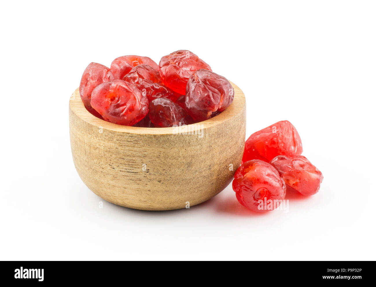 Red dry cherries in a wooden bowl isolated on white background Stock ...