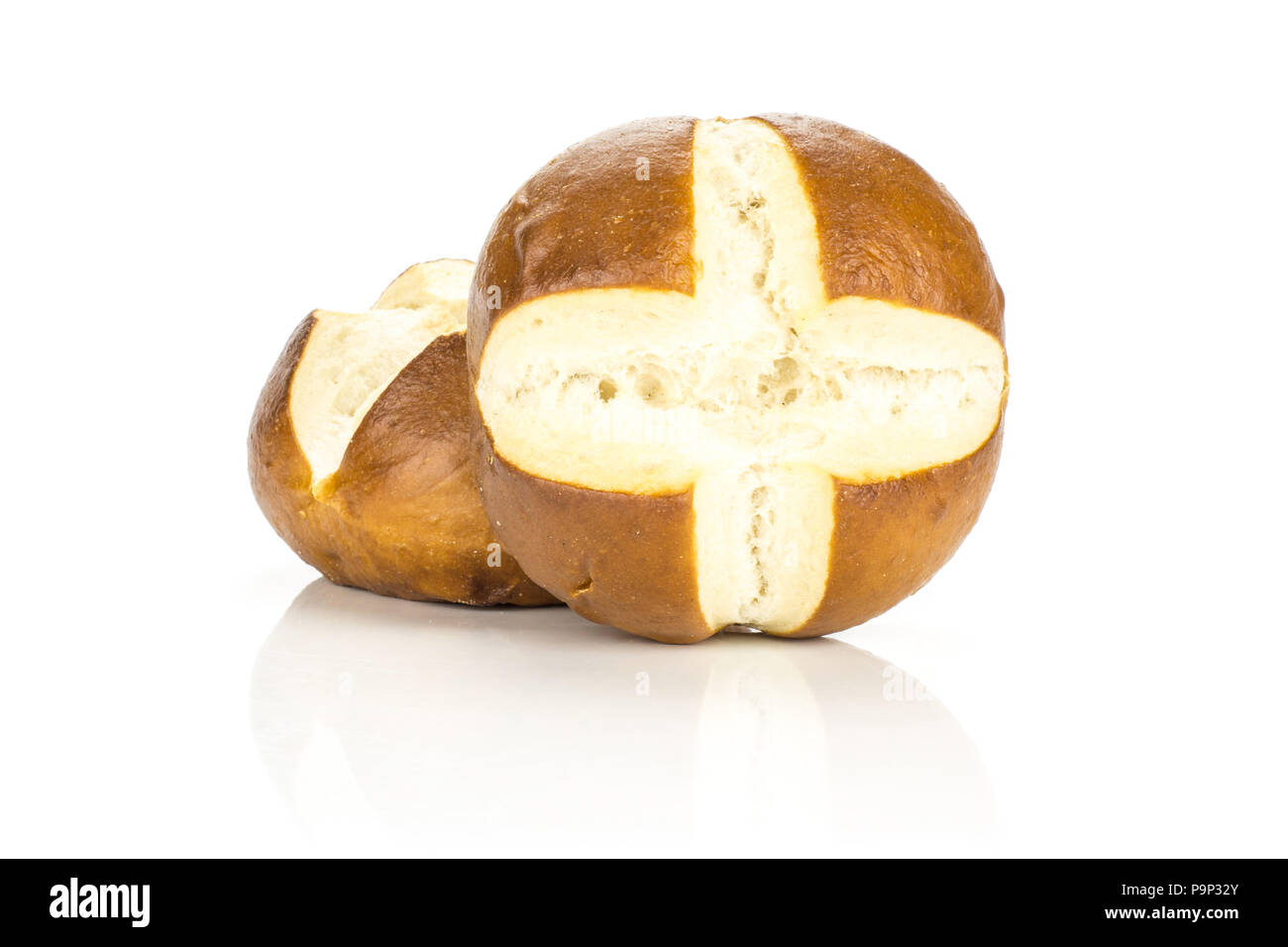 Fresh Bavarian bread buns isolated on white background two baked loaves ...
