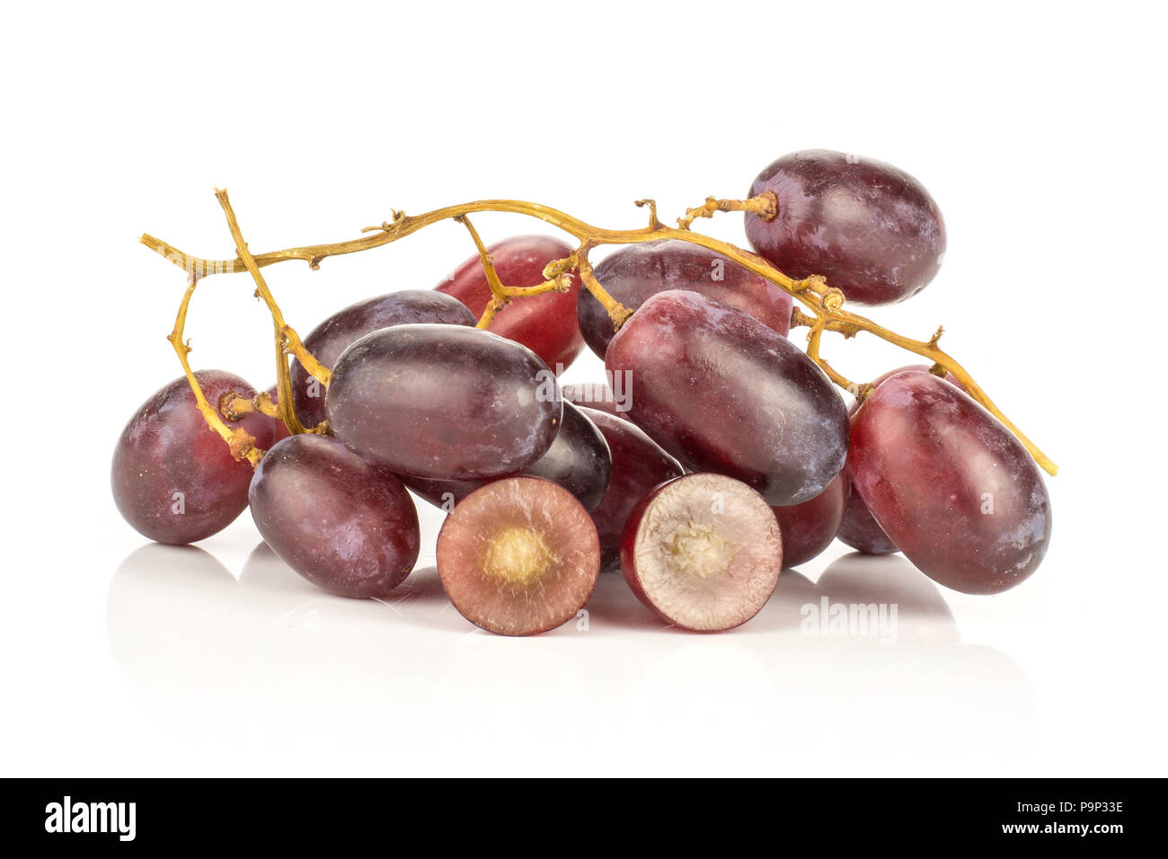 Red globe grape cluster and one berry cut in half isolated on white ...