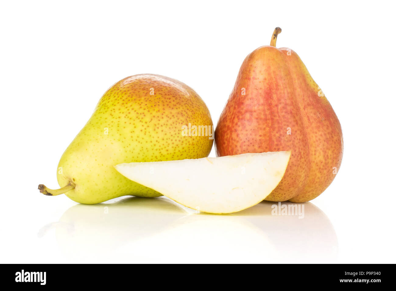 Group of two whole one slice of fresh red pear forelle variety isolated ...