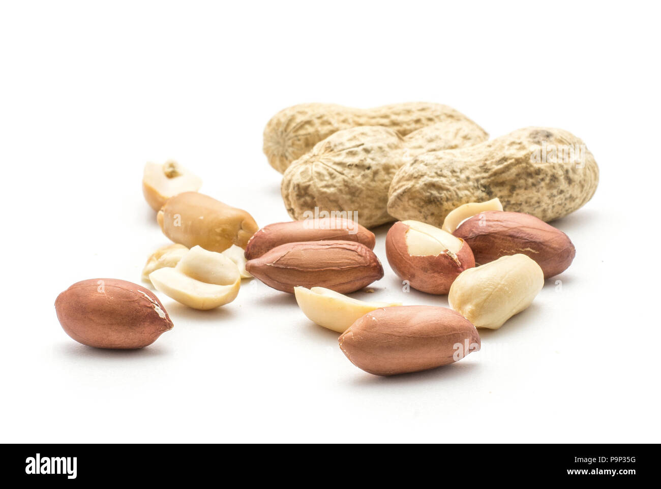 Peanuts stack (unshelled, shelled, broken, halved, whole) isolated on ...