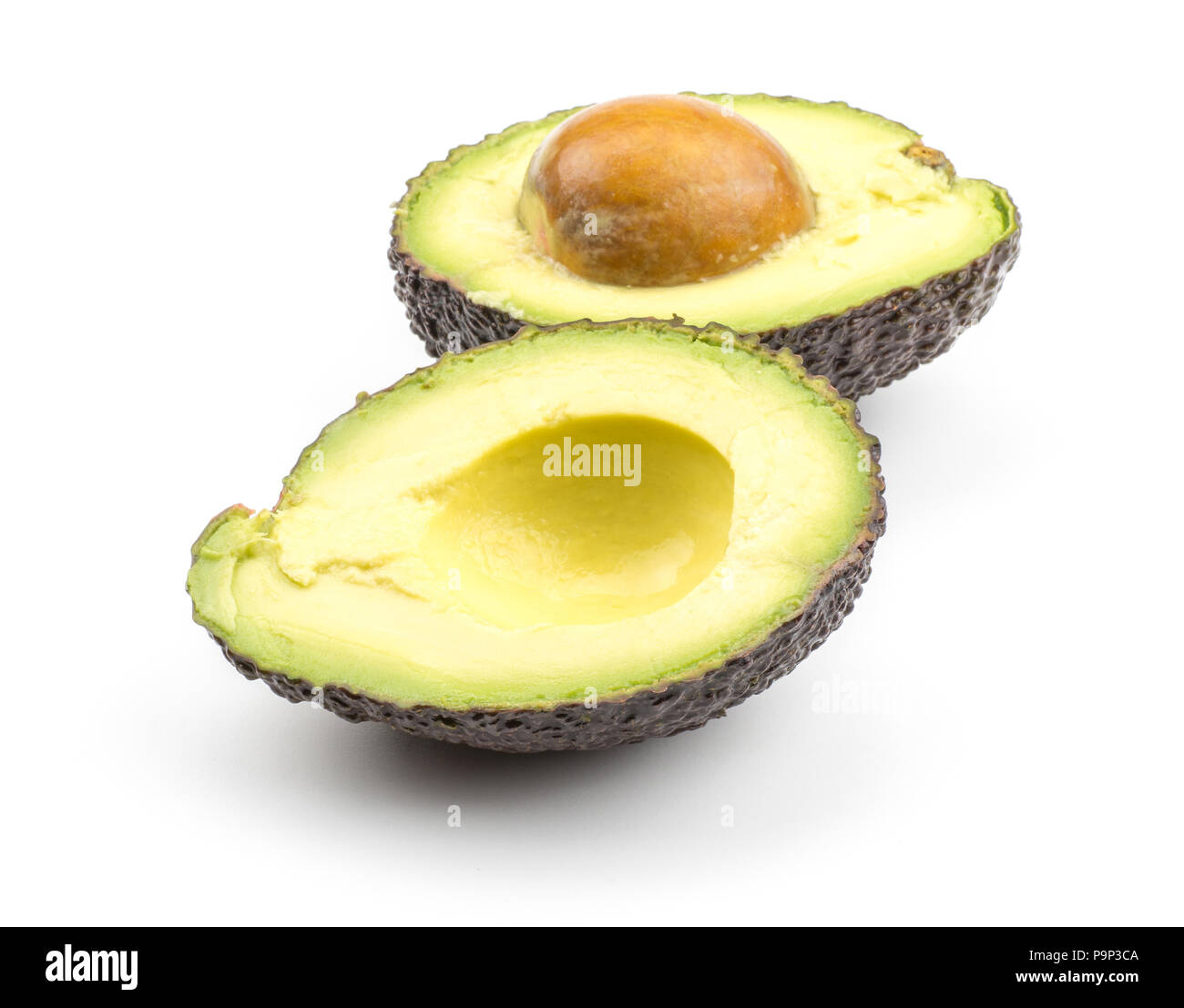 Sliced green brown avocado isolated on white background two alligator ...