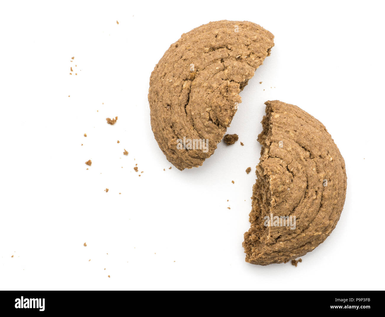 One cracked cocoa oat cookie top view isolated on white background drop ...