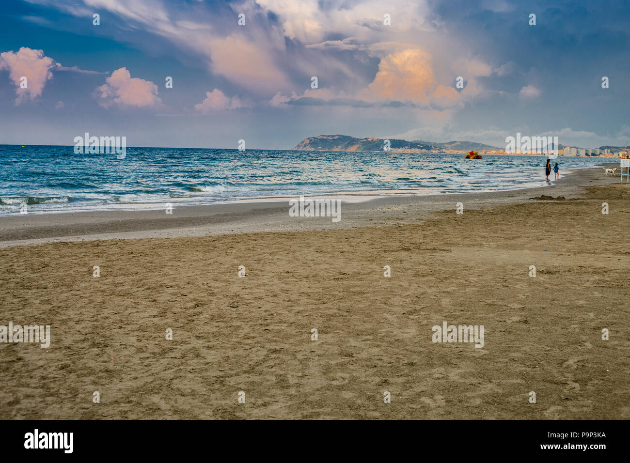 sunset on the beach in Italy Stock Photo - Alamy