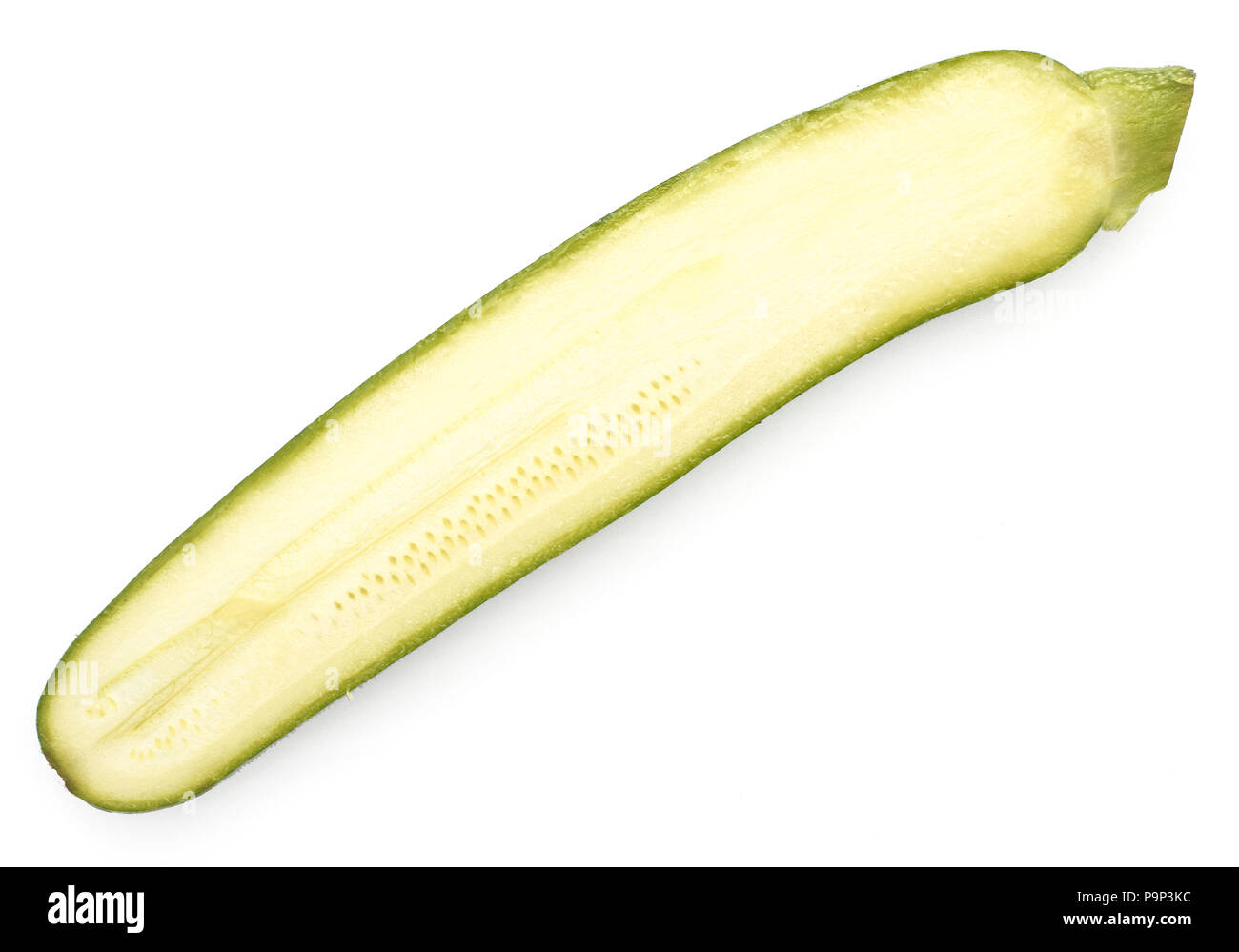 One green zucchini half top view isolated on white background long raw ...