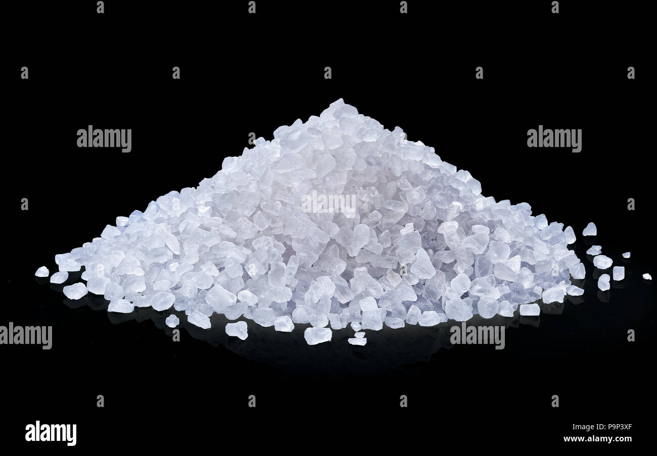 heap of salt isolated on black background with clipping path Stock ...