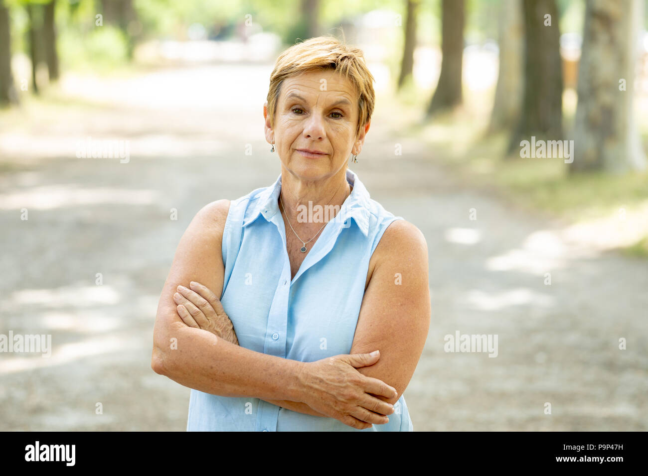 Serious senior woman looking at camera hi-res stock photography and ...