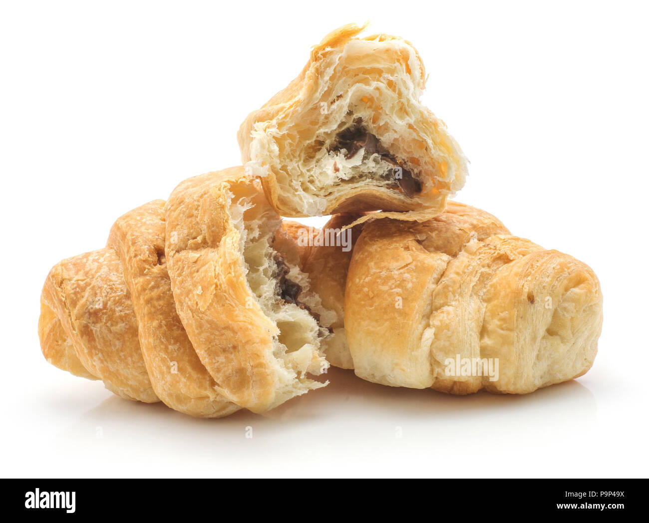 Croissants or cornetto with chocolate cream inside isolated on white ...
